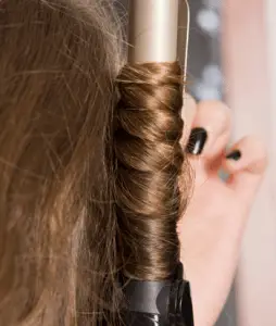 Who Invented the Curling Iron and When